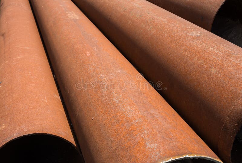 Rusty metal pipes stack stock photo. Image of pipework - 79566250