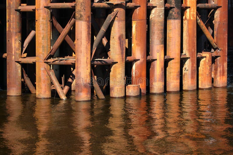 Rusty Metal Pipes in Water, Supports of Old Bridge Construction Stock ...