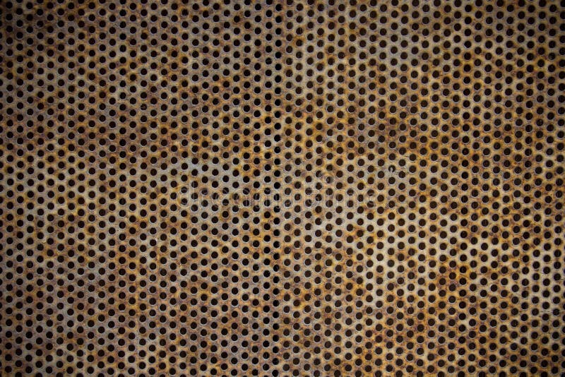 Rusty metal plate holes stock photo. Image of brown, symmetry - 43454144