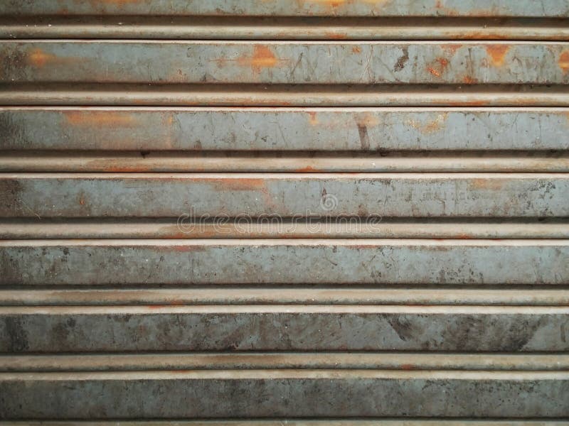 Rusty Metal Roller Shutter stock image. Image of surface - 356412451