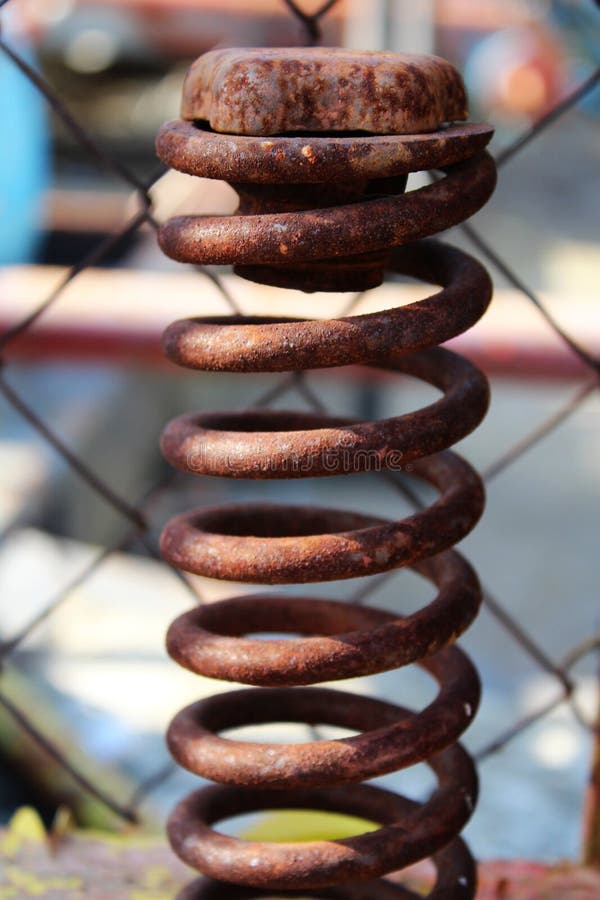 Rusty metal spring stock image. Image of machine, shadow - 46731447