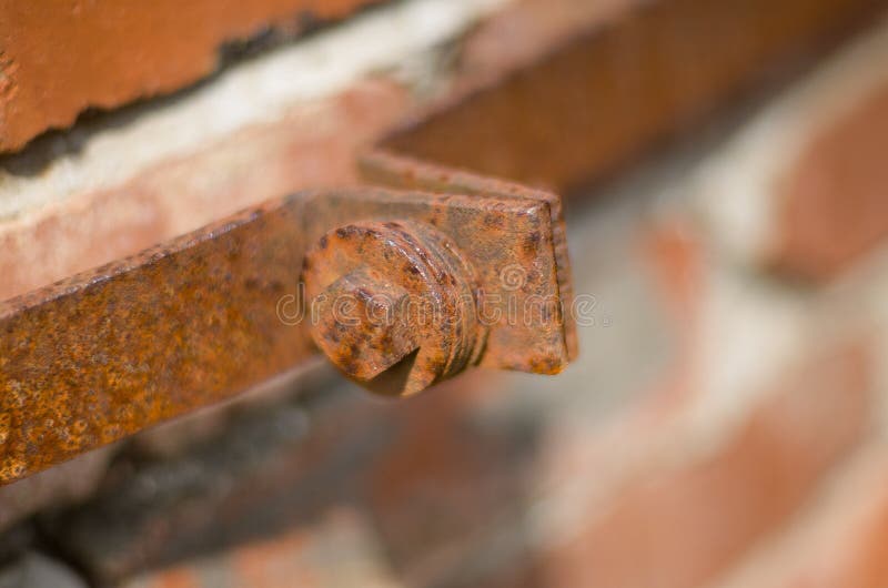 Rusty metal strip and bolt stock photo. Image of building - 96293648