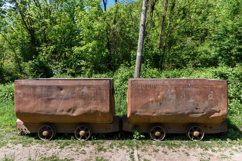 Rusty Metal Wagon at the Entrance To Mine Stock Photo - Image of nature ...