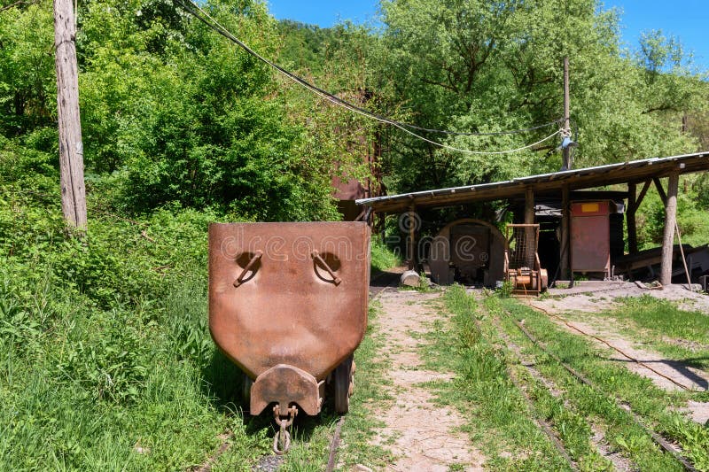 Rusty Metal Wagon at the Entrance To Mine Stock Image - Image of ...