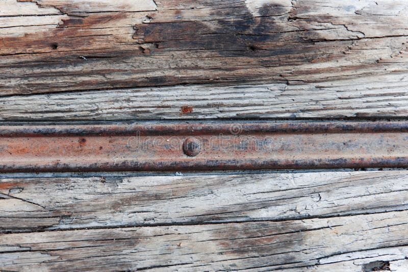 Rusty metal in the wood stock photo. Image of faded - 240073496