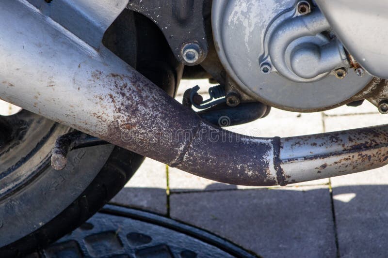 Rusty Muffler on an Old Weathered Scooter. Stock Photo - Image of ...