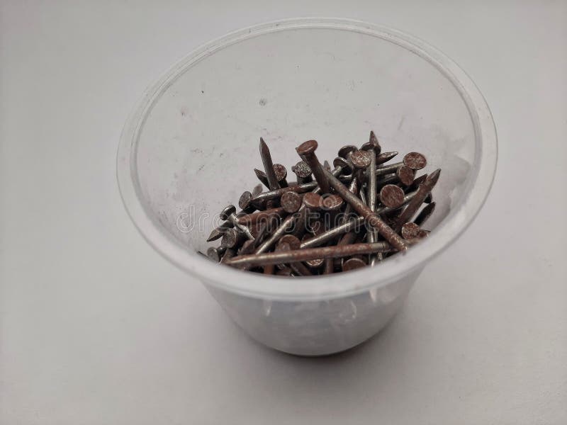 Rusty Nail in a Transparent Plastic Bottle Stock Image - Image of nail ...