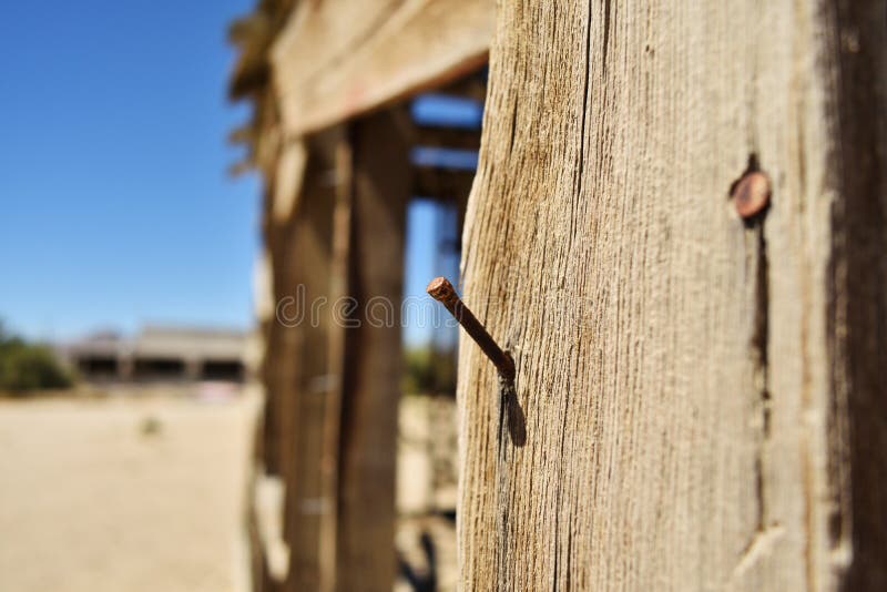 Nail in Wood Close Up. Ruined Building in the Desert Stock Photo ...