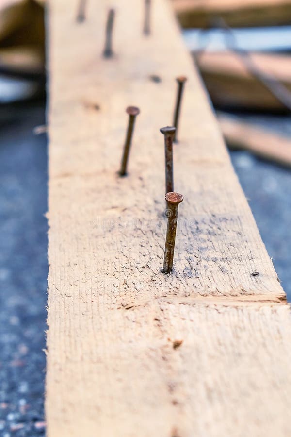 Rusty nails in the Board stock image. Image of rusty - 96008627