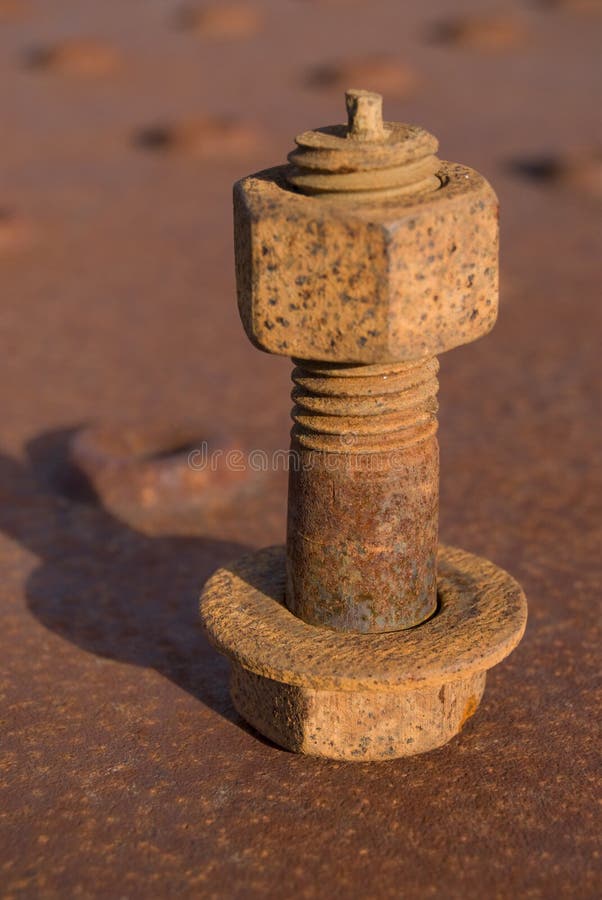 Rusty Bolts Pattern - Aged and Dirty Metallic Part. Stock Photo - Image ...