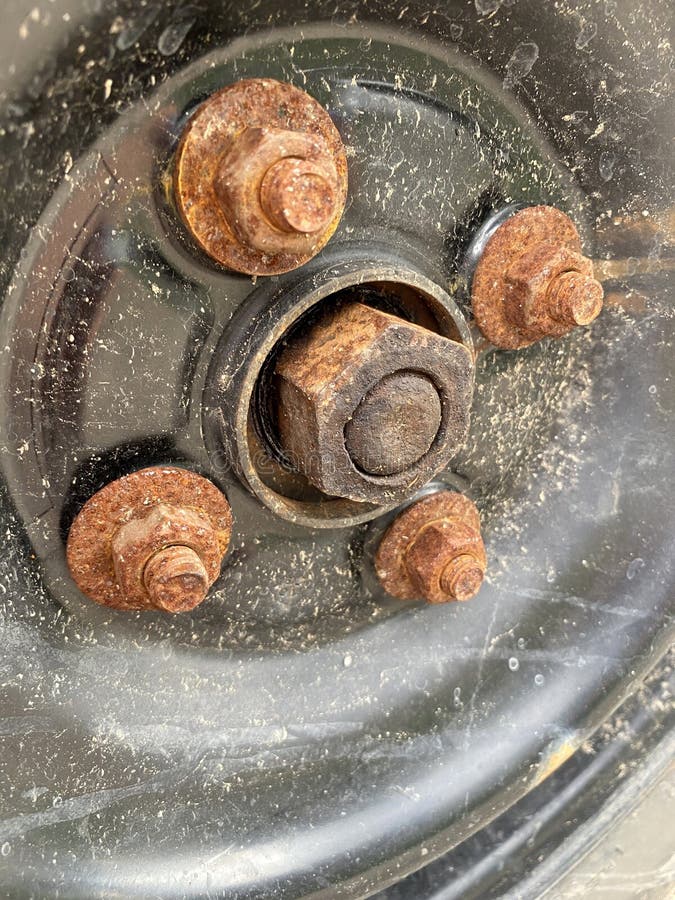 Rusty nut on old wheel stock photo. Image of close, technology - 287370072
