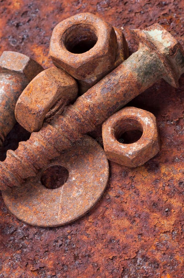 Rusty Nuts and Bolts on Rusty Metal Close Up Stock Image - Image of ...