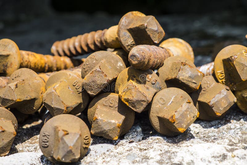 Rusty nuts and bolts stock image. Image of industrial - 98075799