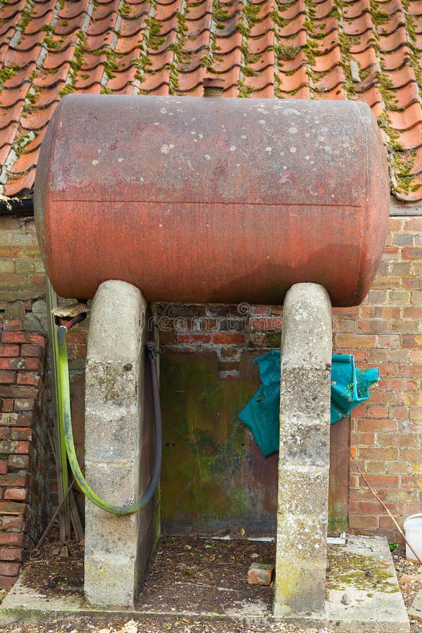 Rusty Oil Tank on Concrete Supports Stock Image - Image of stand, hose ...