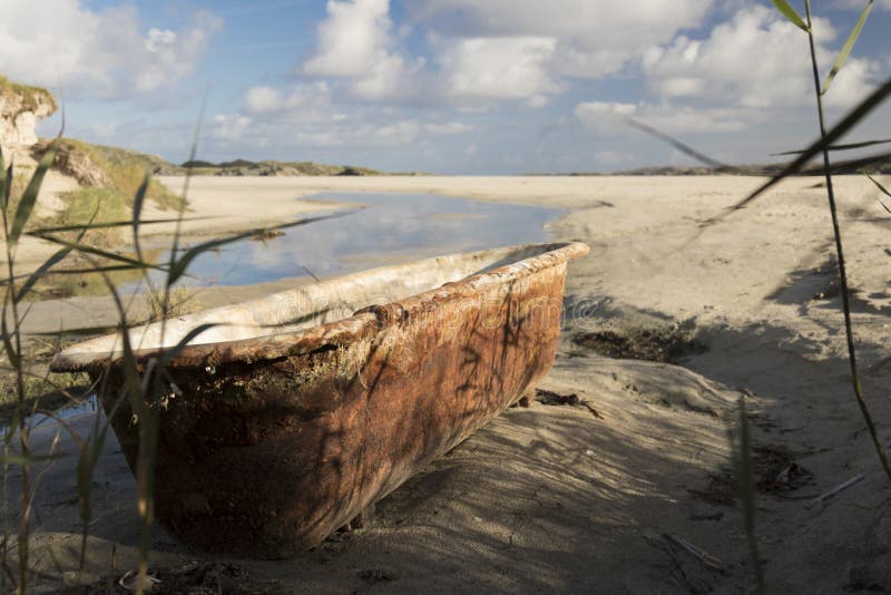 Rusty old bath on beach stock photo. Image of rusting - 60764658