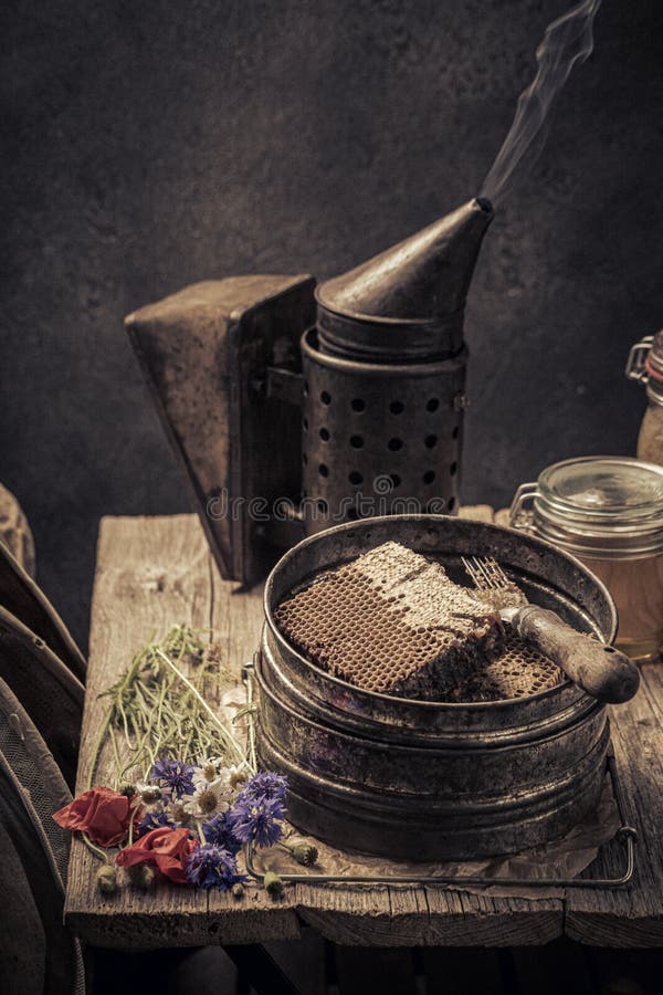 Rusty and Old Beekeeper Tools with Honey, Honeycombs and Hats Stock ...