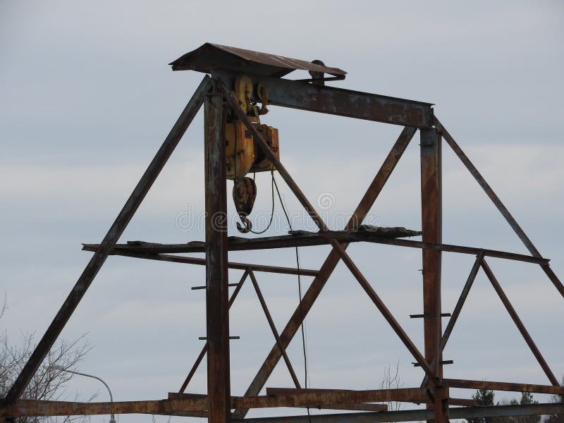 Rusty Old Buildings, a Crane and a Pole Repair Work at Russia Stock ...