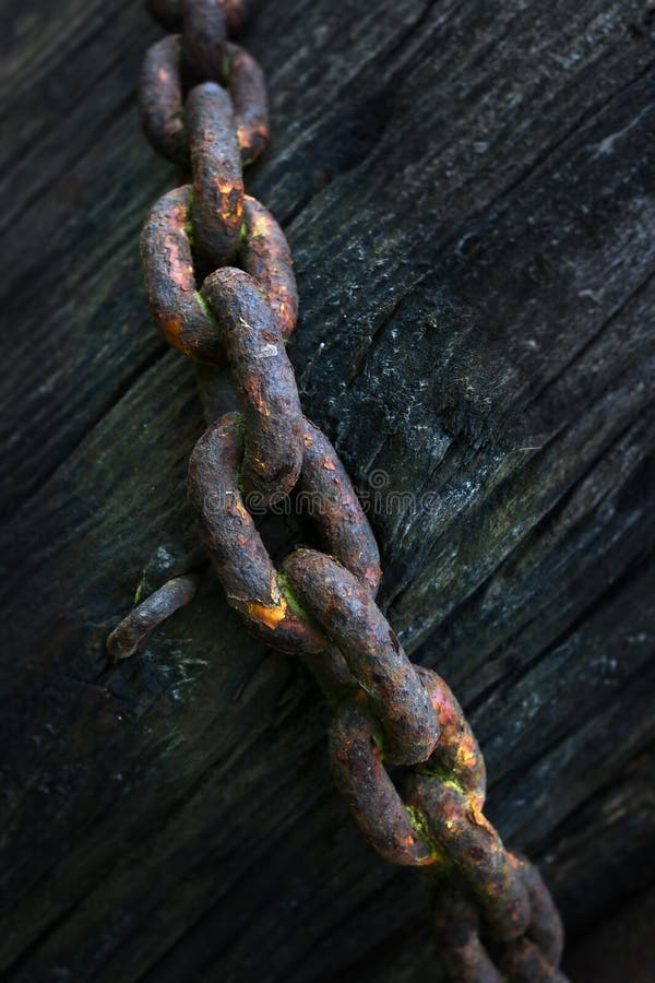 Rusty old chain stock image. Image of links, metal, wood - 80994767