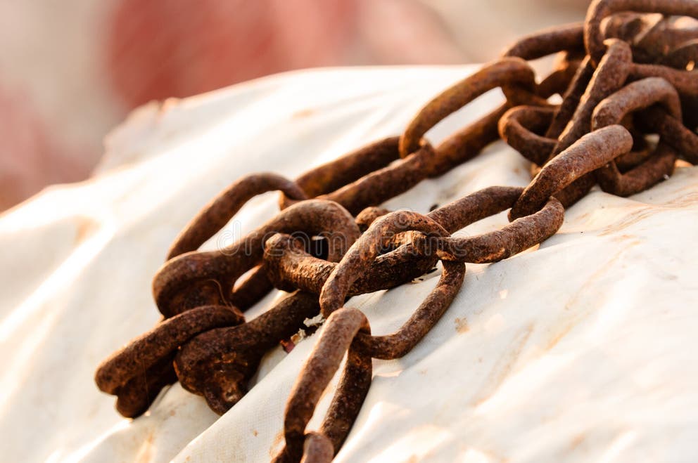 Rusty old chains of a boat stock photo. Image of metal - 23133660