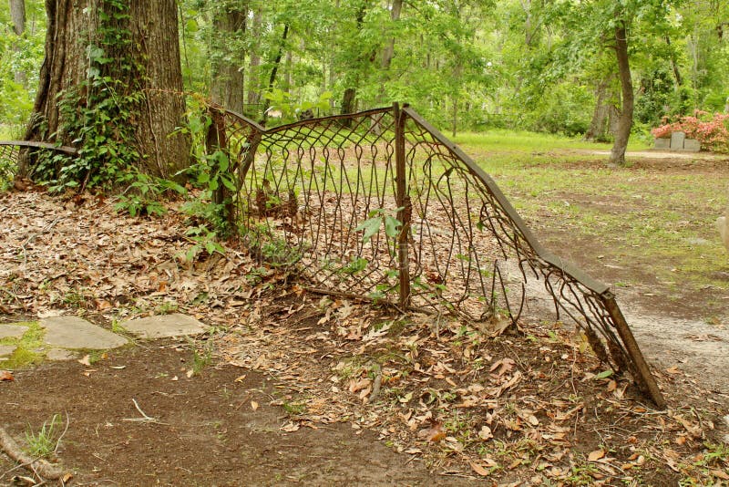 Old Fence Falling Down in a Park Stock Photo - Image of rusty, yard ...