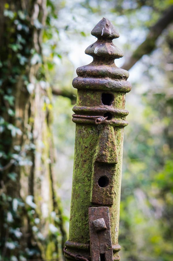 Old rusty metal gate post stock photo. Image of deep - 239229668