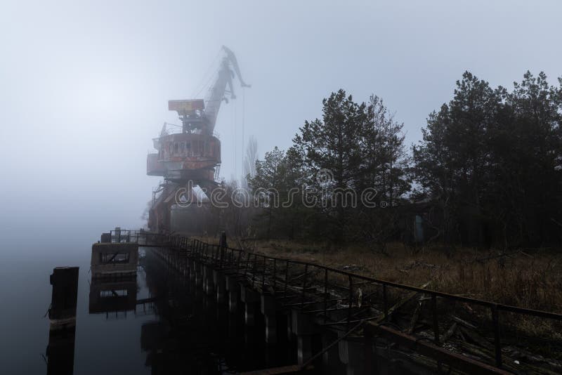 Rusty Old Industrial Dock Cranes at Industrial Dock Stock Photo - Image ...