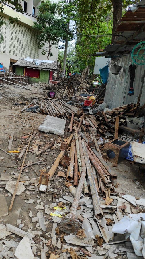 Rusty Old Iron And Tree Piles On The Construction Site. Stock Image ...