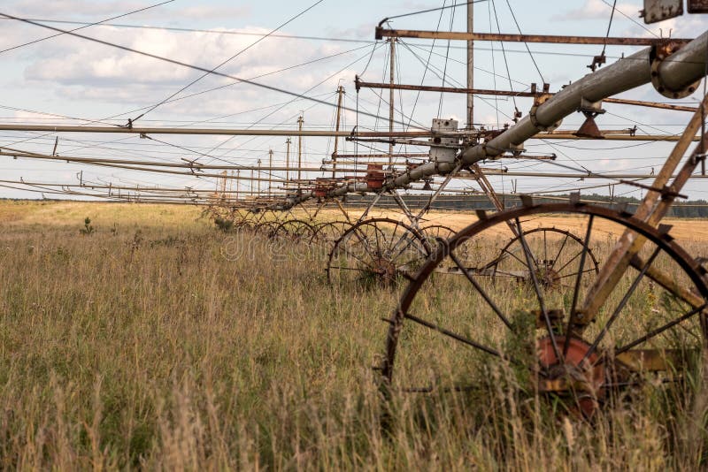 Rusty Old Irrigation System of Fields Stock Photo - Image of automated ...