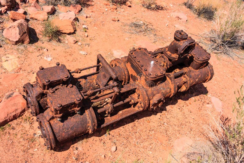 A Rusty Old Machine is Laying on the Ground in a Desert Stock ...