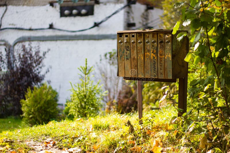The Rusty Old Mailboxes on the Autumn Nature. Abandoned Iron Mailboxes ...