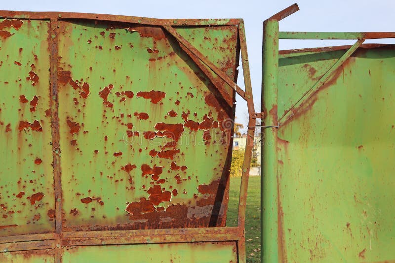 Rusty Old Metal Fence in the City Stock Photo - Image of green, ruined ...