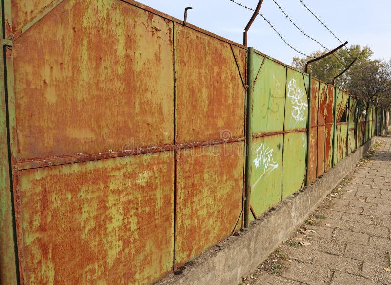 Rusty Old Metal Fence in the City Stock Image - Image of weathered ...