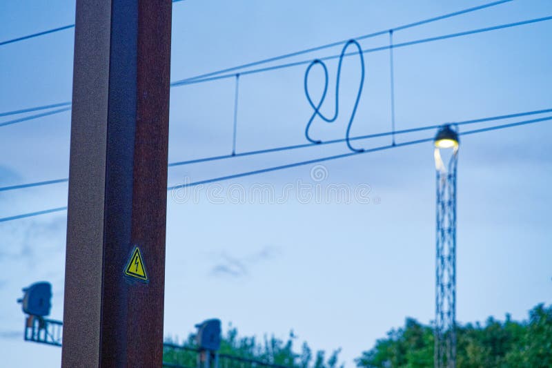 Old Rusty Metal Pole with Yellow Electric Warning Sign Stock Image ...