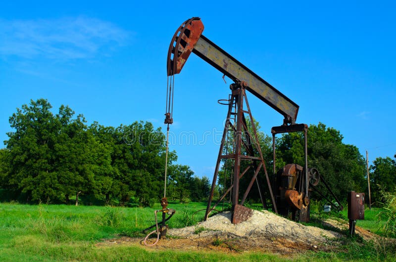 Rusty old oil well stock photo. Image of industrial, mineral - 26779506