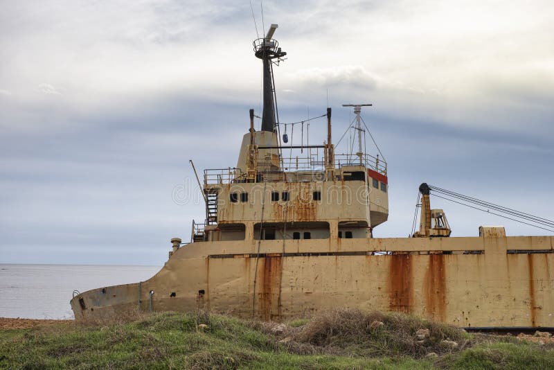 Rusty old ship near shore stock photo. Image of steel - 62690900