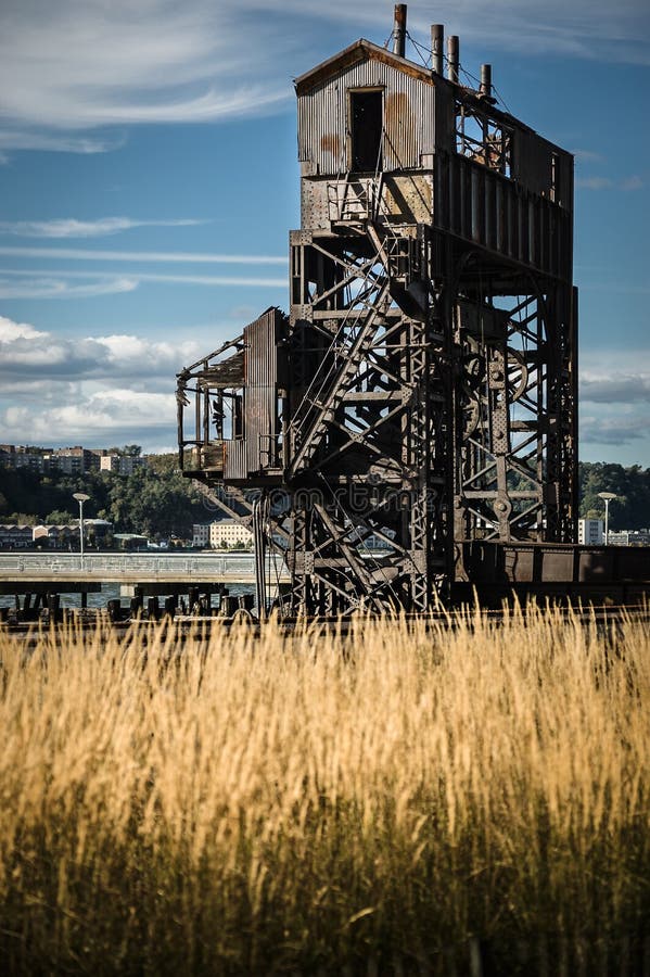 Rusty Old Shipping Terminal with a Blue Sky Stock Image - Image of ...