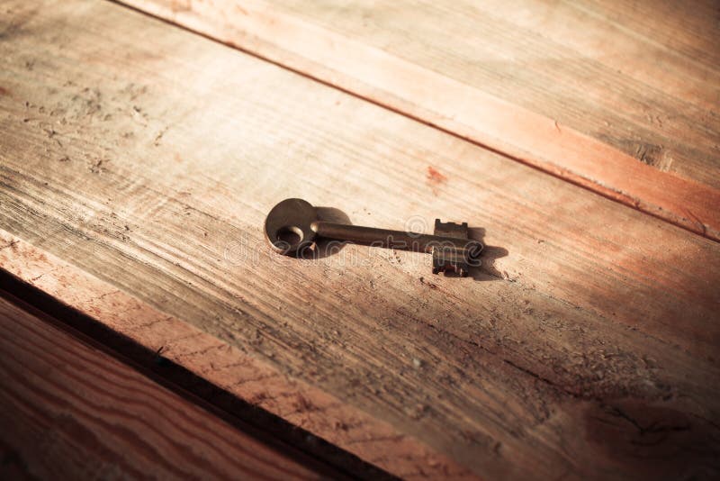 Rusty Old Skeleton Key on Dark Rustic Barnwood Stock Photo - Image of ...