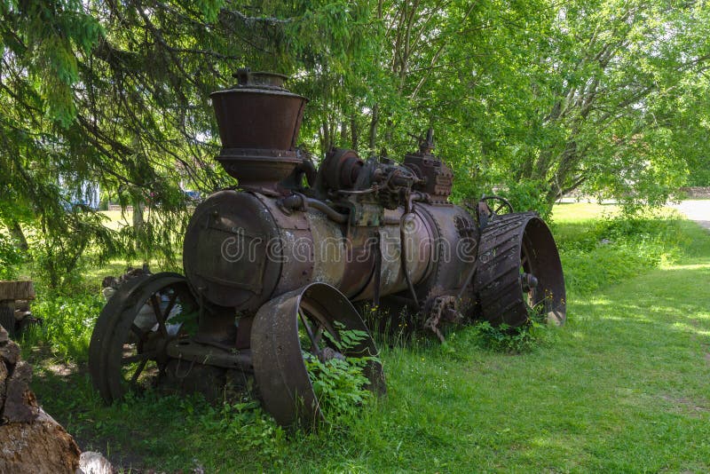 Rusty Old Steam Tractor on the Lawn Stock Image - Image of grass, tree ...