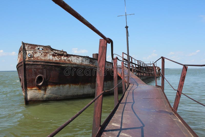 Rusty Old Steamer on the Water of the Sea Boat Ramp Stock Photo - Image ...