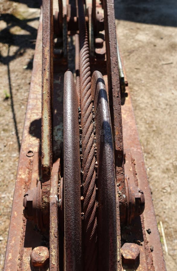 Rusty Old Steel Cable Wrapped Around Old Pulley Stock Image - Image of ...