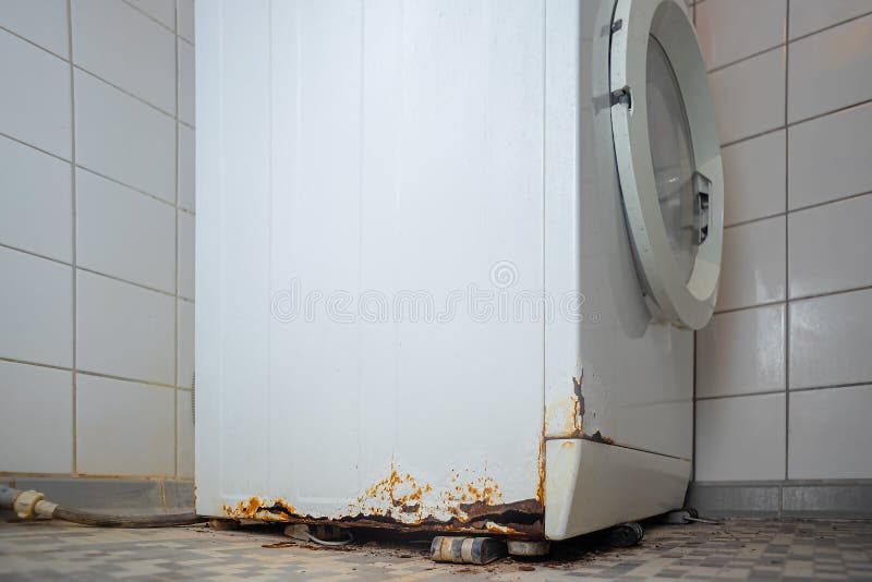Rusty Old Washing Machine in a Bathroom - Broken Corner Stock Photo ...