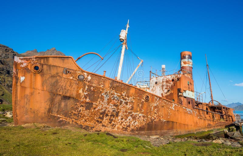 Rusty Old Whaler Beached beside Wooden Dock Stock Image - Image of boat ...
