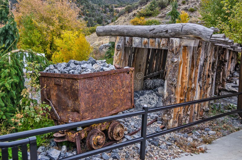 Rusty Ore Cart and Adit stock photo. Image of landscape - 140852772