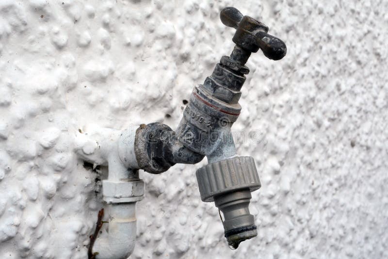 Rusty outdoor tap stock photo. Image of worn, house, outdoor - 65348376