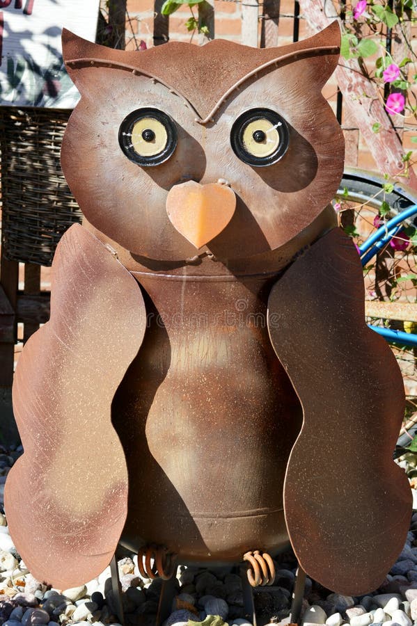 Rusty Owl stock image. Image of still, garden, wise, bird - 96362693