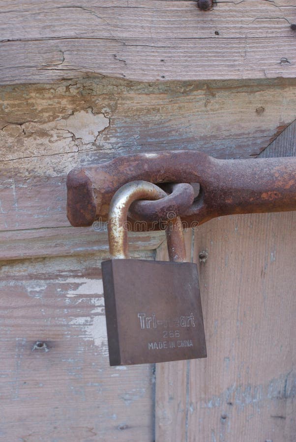 Rusty PadLock stock image. Image of padlock, closed, wood - 10832775