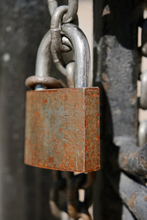 Rusty Padlock with Chain on a Metal Gate Closeup Image, Prison Law ...