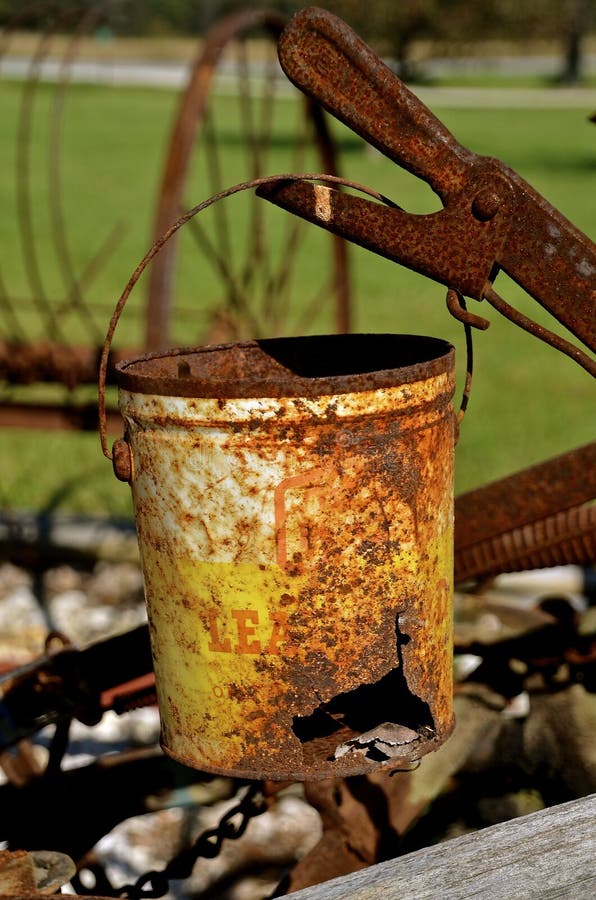 Old Rusty Pail Hangs from a Beam Stock Image - Image of hanger, antique ...