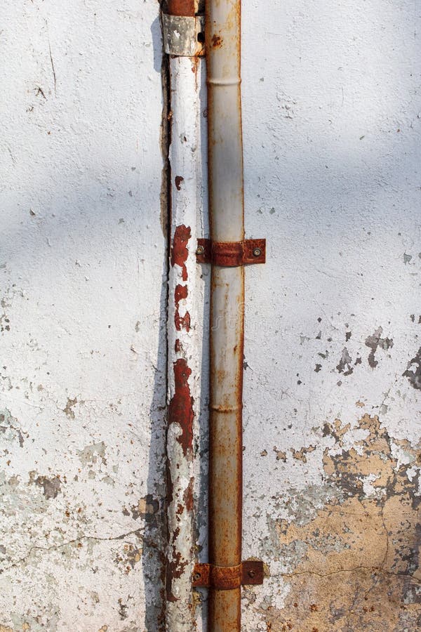 Gas Pipe Hanging on the Wall of a Building Stock Photo - Image of ...