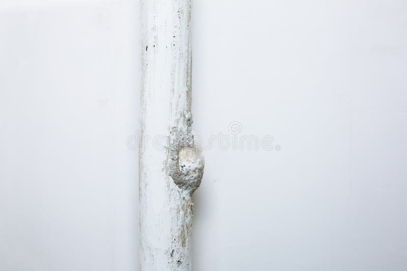 Rusty Pipe in the House. Wall with Whitewash in the Flat with ...